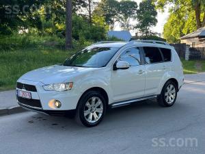Balts Mitsubishi Outlander 2010 Rīga, ar dzinēja tilpumu 2.40 L un nobraukumu 0 tūkst. km par 3299 €, foto  vietnē AUTOMOTO.COM.LV