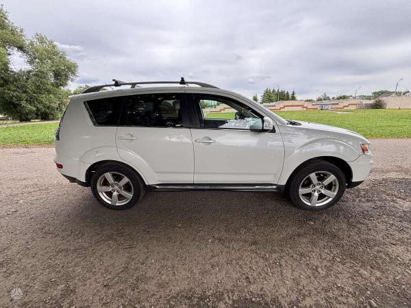 Balts Mitsubishi Outlander 2010 Panevēža, ar dzinēja tilpumu 2.18 L un nobraukumu 300 tūkst. km par 3590 €, foto 6 vietnē AUTOMOTO.COM.LV