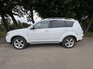 White Mitsubishi Outlander 2010 in Panevezys, with an engine capacity of 2.18 L and mileage of 300 thousand km for 3590 €, photo 4 on AUTOMOTO.COM.LV