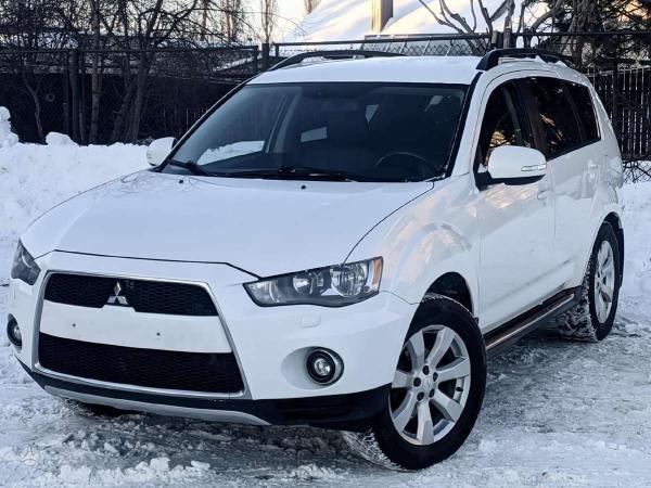 White Mitsubishi Outlander 2011 in Kretinga, with an engine capacity of 2.18 L and mileage of 250 thousand km for 4850 €, photo 1 on AUTOMOTO.COM.LV