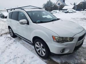 White Mitsubishi Outlander 2011 in Utena, with an engine capacity of 2.18 L and mileage of 166 thousand km for 3300 €, photo  on AUTOMOTO.COM.LV