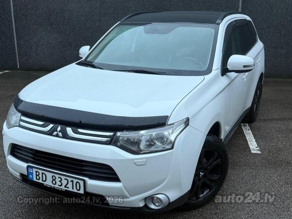 White Mitsubishi Outlander 2013 in Tallinn, with an engine capacity of 2.30 L and mileage of 259 thousand km for 7990 €, photo 3 on AUTOMOTO.COM.LV
