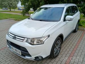Balts Mitsubishi Outlander 2014 Liepāja, ar dzinēja tilpumu 2.30 L un nobraukumu 199 tūkst. km par 9990 €, foto  vietnē AUTOMOTO.COM.LV