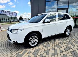 White Mitsubishi Outlander 2014 in Siauliai, with an engine capacity of 2.20 L and mileage of 215 thousand km for 7950 €, photo 5 on AUTOMOTO.COM.LV