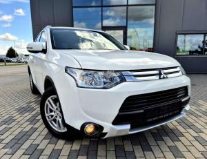 White Mitsubishi Outlander 2014 in Siauliai, with an engine capacity of 2.20 L and mileage of 215 thousand km for 7950 €, photo 13 on AUTOMOTO.COM.LV