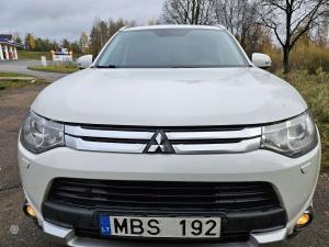 Balts Mitsubishi Outlander 2015 Kauņa, ar dzinēja tilpumu 2.27 L un nobraukumu 252 tūkst. km par 11400 €, foto  vietnē AUTOMOTO.COM.LV
