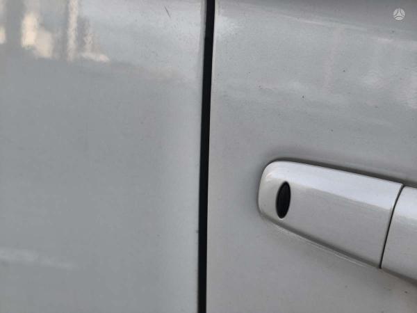White Mitsubishi Outlander 2015 in Vilnius, with an engine capacity of 2.00 L and mileage of 260 thousand km for 12950 €, photo 8 on AUTOMOTO.COM.LV