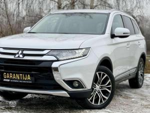 White Mitsubishi Outlander 2017 in Siauliai, with an engine capacity of 2.27 L and mileage of 185 thousand km for 11950 €, photo 16 on AUTOMOTO.COM.LV