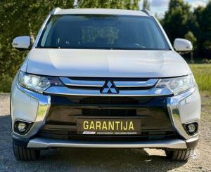 White Mitsubishi Outlander 2018 in Siauliai, with an engine capacity of 2.27 L and mileage of 241 thousand km for 14750 €, photo 6 on AUTOMOTO.COM.LV