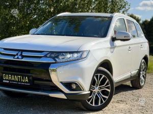 White Mitsubishi Outlander 2018 in Siauliai, with an engine capacity of 2.27 L and mileage of 241 thousand km for 14750 €, photo 15 on AUTOMOTO.COM.LV