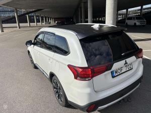 White Mitsubishi Outlander 2018 in Kaunas, with an engine capacity of 2.27 L and mileage of 259 thousand km for 14000 €, photo 7 on AUTOMOTO.COM.LV