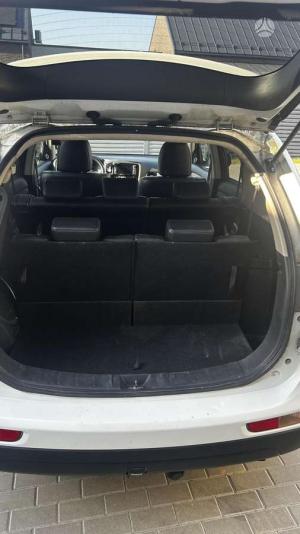 White Mitsubishi Outlander 2013 in Vilnius, with an engine capacity of 2.27 L and mileage of 314 thousand km for 6200 €, photo 11 on AUTOMOTO.COM.LV