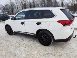 White Mitsubishi Outlander 2016 in Jurbarkas, with an engine capacity of 2.27 L and mileage of 247 thousand km for 8100 €, photo 4 on AUTOMOTO.COM.LV