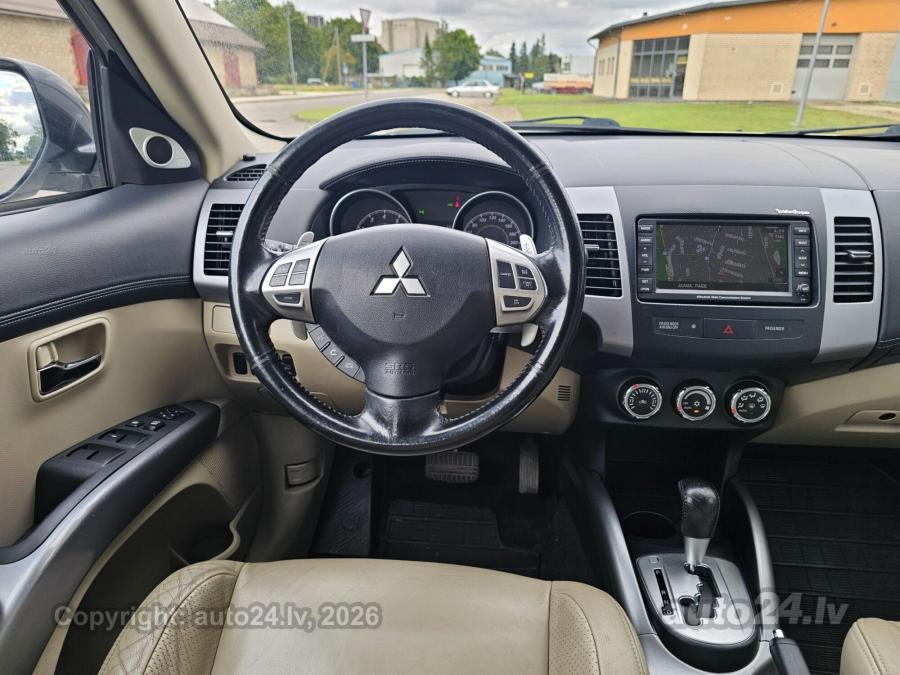 Balts Mitsubishi Outlander 2011 Paide, ar dzinēja tilpumu 2.40 L un nobraukumu 135 tūkst. km par 5990 €, foto 8 vietnē AUTOMOTO.COM.LV