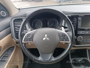White Mitsubishi Outlander 2015 in Tallinn, with an engine capacity of 2.20 L and mileage of 112 thousand km for 11900 €, photo 16 on AUTOMOTO.COM.LV