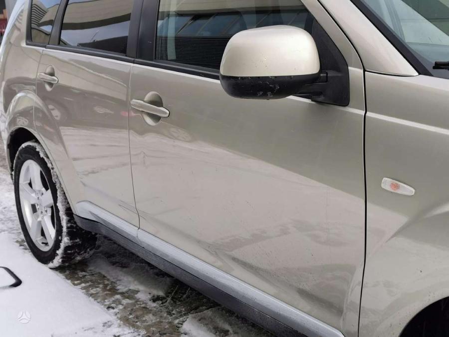Dzeltens Mitsubishi Outlander 2008 Viļņa, ar dzinēja tilpumu 1.97 L un nobraukumu 220 tūkst. km par 2600 €, foto 14 vietnē AUTOMOTO.COM.LV