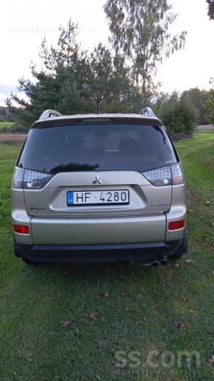 Dzeltens Mitsubishi Outlander 2008 Rēzekne, ar dzinēja tilpumu 2.00 L un nobraukumu 298 tūkst. km par 2200 €, foto 3 vietnē AUTOMOTO.COM.LV