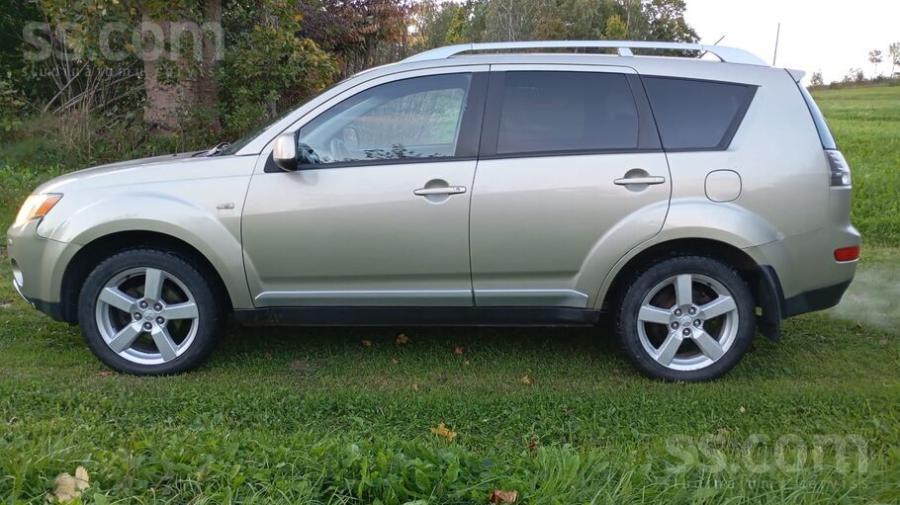 Dzeltens Mitsubishi Outlander 2008 Rēzekne, ar dzinēja tilpumu 2.00 L un nobraukumu 298 tūkst. km par 2200 €, foto 4 vietnē AUTOMOTO.COM.LV