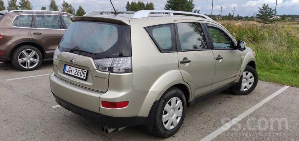 Dzeltens Mitsubishi Outlander 2008 Jēkabpils, ar dzinēja tilpumu 2.00 L un nobraukumu 339 tūkst. km par 1850 €, foto 4 vietnē AUTOMOTO.COM.LV