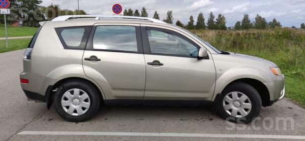 Dzeltens Mitsubishi Outlander 2008 Jēkabpils, ar dzinēja tilpumu 2.00 L un nobraukumu 339 tūkst. km par 1850 €, foto 5 vietnē AUTOMOTO.COM.LV