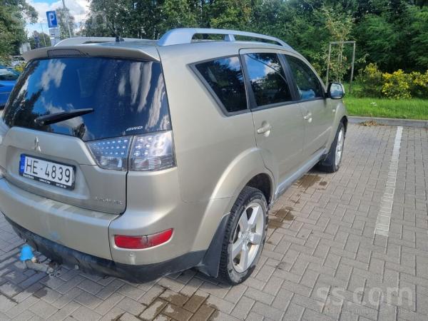 Dzeltens Mitsubishi Outlander 2008 Jelgava, ar dzinēja tilpumu 2.40 L un nobraukumu 296 tūkst. km par 2700 €, foto 4 vietnē AUTOMOTO.COM.LV