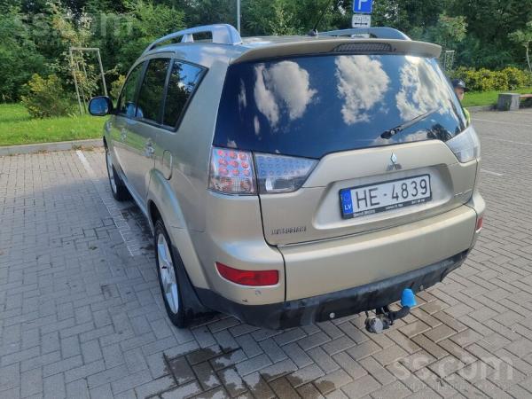 Dzeltens Mitsubishi Outlander 2008 Jelgava, ar dzinēja tilpumu 2.40 L un nobraukumu 296 tūkst. km par 2700 €, foto 5 vietnē AUTOMOTO.COM.LV