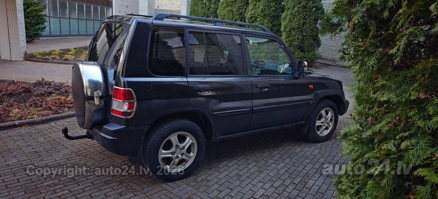 Melns Mitsubishi Pajero 2001 Sindi, ar dzinēja tilpumu 2.00 L un nobraukumu 147 tūkst. km par 3800 €, foto 7 vietnē AUTOMOTO.COM.LV