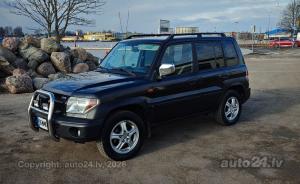 Melns Mitsubishi Pajero 2001 Sindi, ar dzinēja tilpumu 2.00 L un nobraukumu 147 tūkst. km par 3800 €, foto 18 vietnē AUTOMOTO.COM.LV