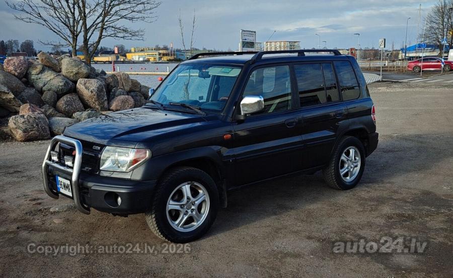 Melns Mitsubishi Pajero 2001 Sindi, ar dzinēja tilpumu 2.00 L un nobraukumu 147 tūkst. km par 3800 €, foto 18 vietnē AUTOMOTO.COM.LV