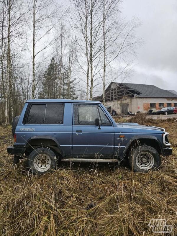Blue Mitsubishi Pajero 1991 in Utena, with an engine capacity of 2.50 L and mileage of 100 thousand km for 1550 €, photo 6 on AUTOMOTO.COM.LV