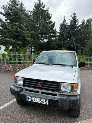 Zils Mitsubishi Pajero 1996 Panevēža, ar dzinēja tilpumu 2.48 L un nobraukumu 176 tūkst. km par 1750 €, foto  vietnē AUTOMOTO.COM.LV