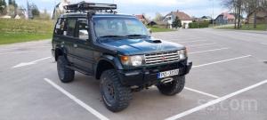 Green Mitsubishi Pajero 1995 in Aluksne, with an engine capacity of 2.80 L and mileage of 390 thousand km for 4880 €, photo  on AUTOMOTO.COM.LV