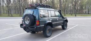 Green Mitsubishi Pajero 1995 in Aluksne, with an engine capacity of 2.80 L and mileage of 390 thousand km for 4880 €, photo 6 on AUTOMOTO.COM.LV