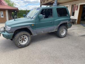 Green Mitsubishi Pajero 1998 in Marijampole, with an engine capacity of 2.80 L and mileage of 394 thousand km for 1700 €, photo 3 on AUTOMOTO.COM.LV