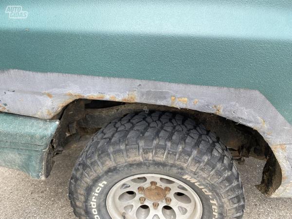 Green Mitsubishi Pajero 1998 in Marijampole, with an engine capacity of 2.80 L and mileage of 394 thousand km for 1700 €, photo 5 on AUTOMOTO.COM.LV