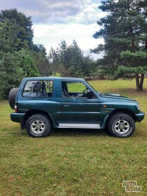 Green Mitsubishi Pajero 2003 in Vilnius, with an engine capacity of 2.50 L and mileage of 254 thousand km for 4300 €, photo 5 on AUTOMOTO.COM.LV