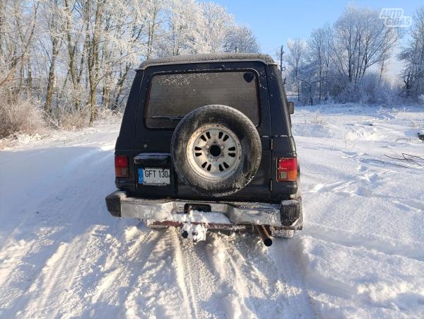 Pelēks Mitsubishi Pajero 1992 Viļņa, ar dzinēja tilpumu 2.50 L un nobraukumu 400 tūkst. km par 2500 €, foto 3 vietnē AUTOMOTO.COM.LV