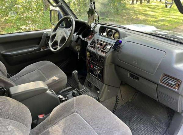 Pelēks Mitsubishi Pajero 2004 Prienai, ar dzinēja tilpumu 2.48 L un nobraukumu 243 tūkst. km par 9500 €, foto 11 vietnē AUTOMOTO.COM.LV