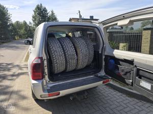 Grey Mitsubishi Pajero 2004 in Vilnius, with an engine capacity of 3.20 L and mileage of 247 thousand km for 14500 €, photo 4 on AUTOMOTO.COM.LV
