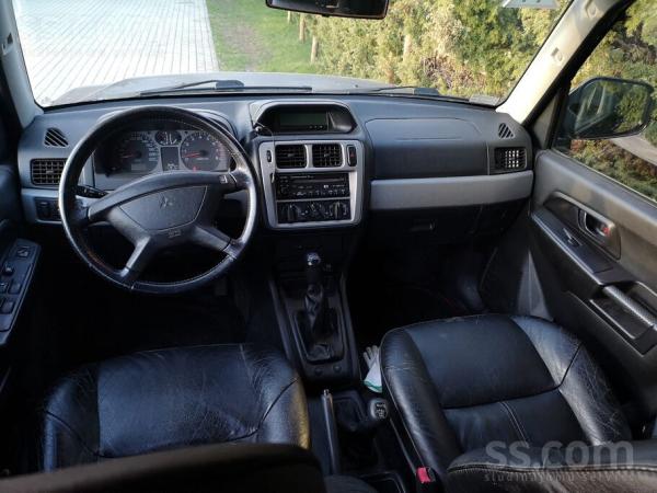 Melns Mitsubishi pajero-pinin 2005 Ogre, ar dzinēja tilpumu 2.00 L un nobraukumu 191 tūkst. km par 3200 €, foto 5 vietnē AUTOMOTO.COM.LV