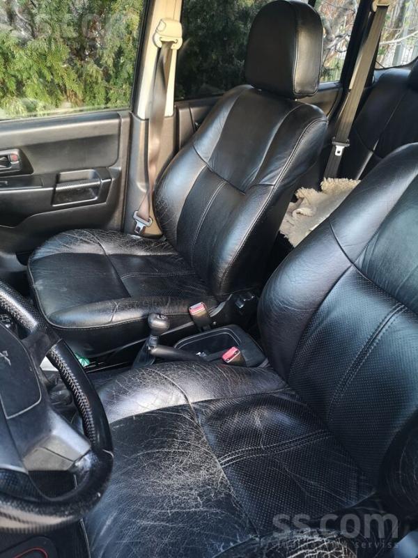 Melns Mitsubishi pajero-pinin 2005 Ogre, ar dzinēja tilpumu 2.00 L un nobraukumu 191 tūkst. km par 3200 €, foto 6 vietnē AUTOMOTO.COM.LV