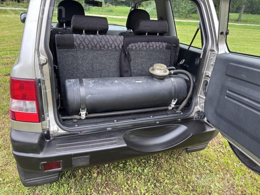 Pelēks Mitsubishi pajero-pinin 1999 Ludza, ar dzinēja tilpumu 1.80 L un nobraukumu 0 tūkst. km par 3500 €, foto 13 vietnē AUTOMOTO.COM.LV