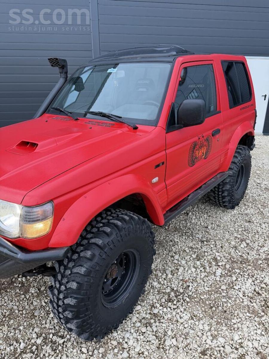 Sarkans Mitsubishi Pajero 1998 Balvi, ar dzinēja tilpumu 3.20 L un nobraukumu 200 tūkst. km par 7499 €, foto 8 vietnē AUTOMOTO.COM.LV