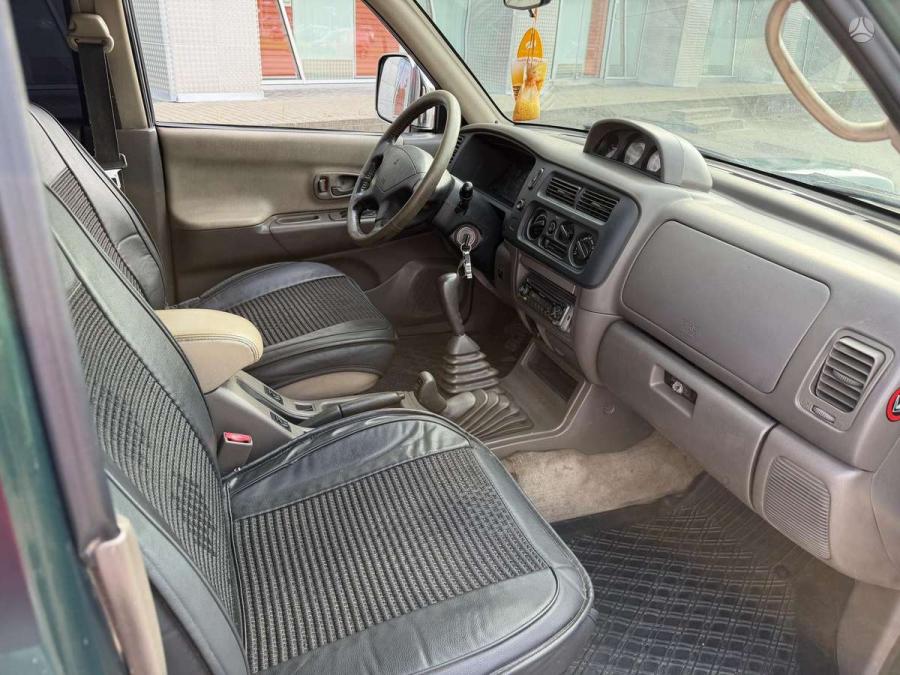 Green Mitsubishi Pajero Sport 1998 in Vilnius, with an engine capacity of 2.48 L and mileage of 289 thousand km for 2800 €, photo 12 on AUTOMOTO.COM.LV