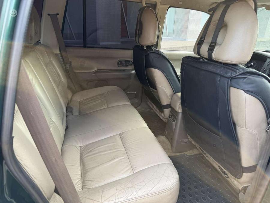 Green Mitsubishi Pajero Sport 1998 in Vilnius, with an engine capacity of 2.48 L and mileage of 289 thousand km for 2800 €, photo 13 on AUTOMOTO.COM.LV