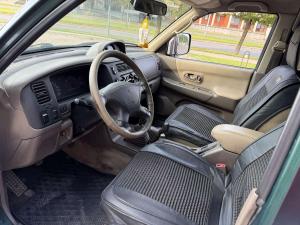 Green Mitsubishi Pajero Sport 1998 in Vilnius, with an engine capacity of 2.48 L and mileage of 289 thousand km for 2800 €, photo 14 on AUTOMOTO.COM.LV