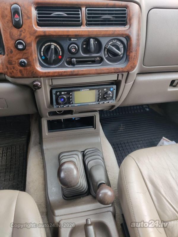 Sarkans Mitsubishi Pajero Sport 1999 Tallina, ar dzinēja tilpumu 3.00 L un nobraukumu 190 tūkst. km par 4600 €, foto 6 vietnē AUTOMOTO.COM.LV