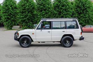 White Mitsubishi Pajero 1990 in Riga, with an engine capacity of 2.50 L and mileage of 335 thousand km for 21500 €, photo 6 on AUTOMOTO.COM.LV