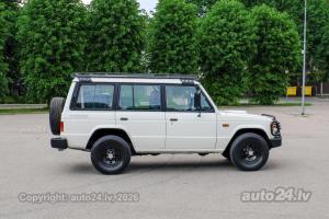 White Mitsubishi Pajero 1990 in Riga, with an engine capacity of 2.50 L and mileage of 335 thousand km for 21500 €, photo 7 on AUTOMOTO.COM.LV