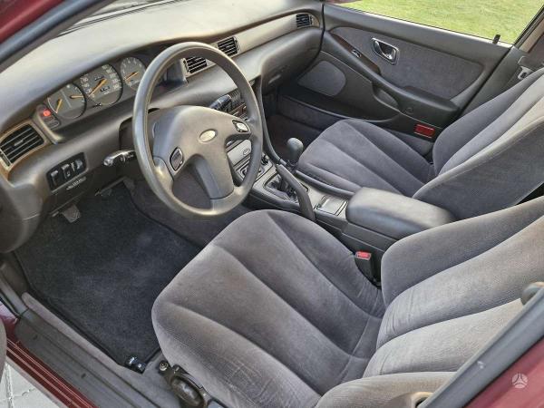 Red Mitsubishi Sigma 1992 in Vilnius, with an engine capacity of 2.97 L and mileage of 141 thousand km for 4900 €, photo 10 on AUTOMOTO.COM.LV